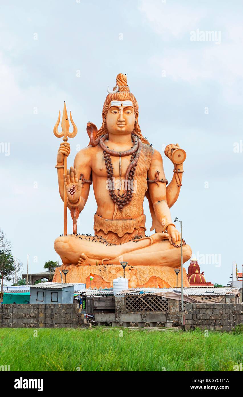 Statue of Lord Shiva near Nageshwar Jyotirlinga Temple, one of the twelve Jyotirlingas ...