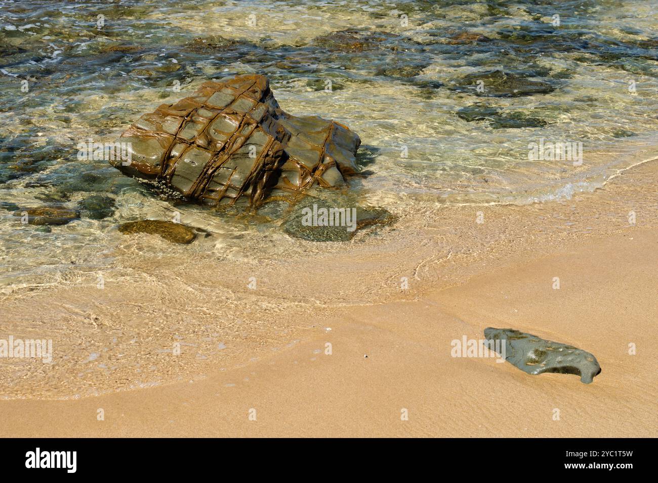 The tireless force of the water keeps polishing these rocks on the ...