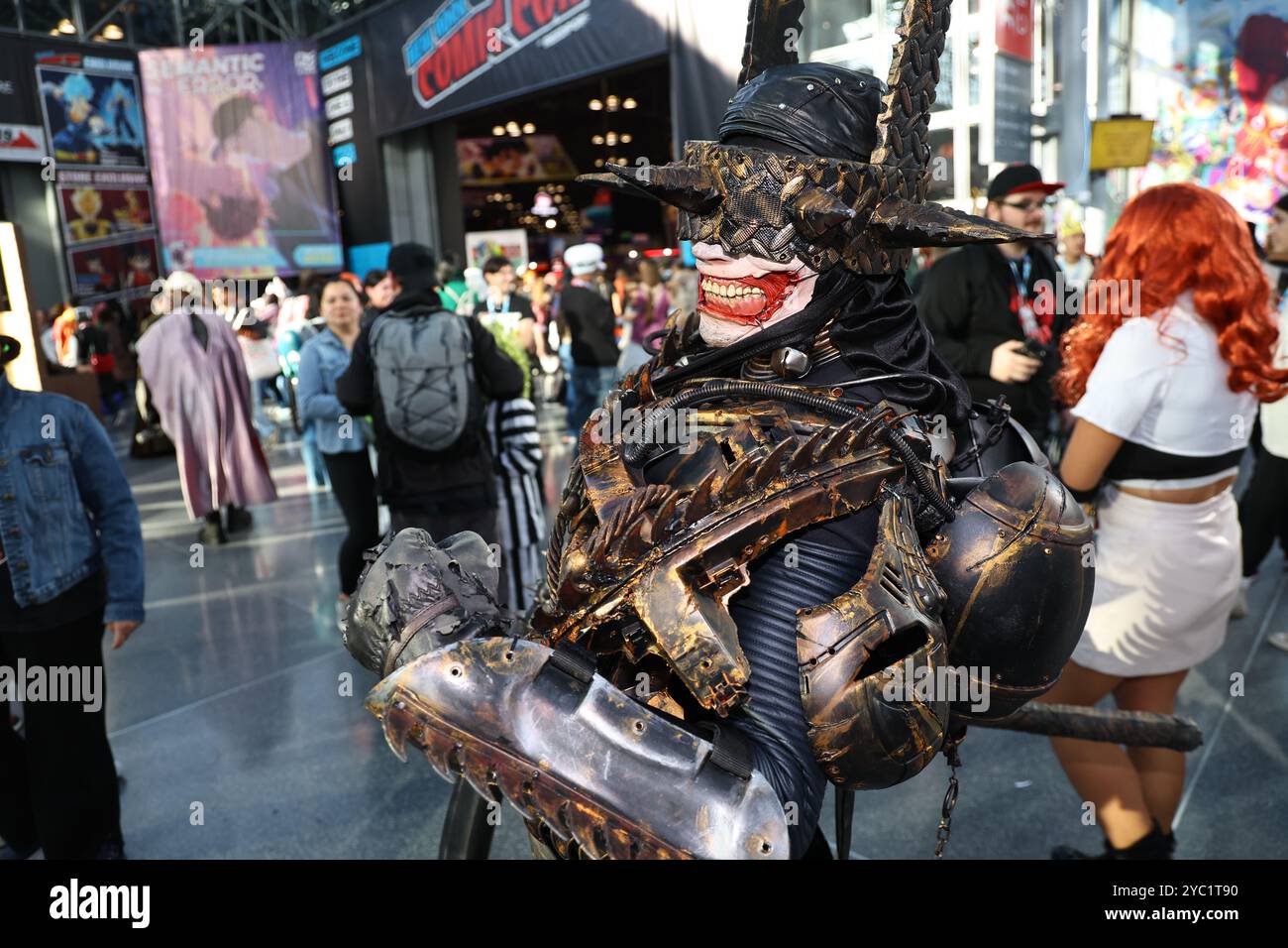 A cosplayer dresses as ''Batman Who Laughs'' for New York Comic Con at ...