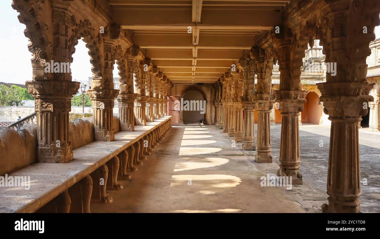 View of the carved arches of the courtyard of Naulakha Palace, Gondal ...