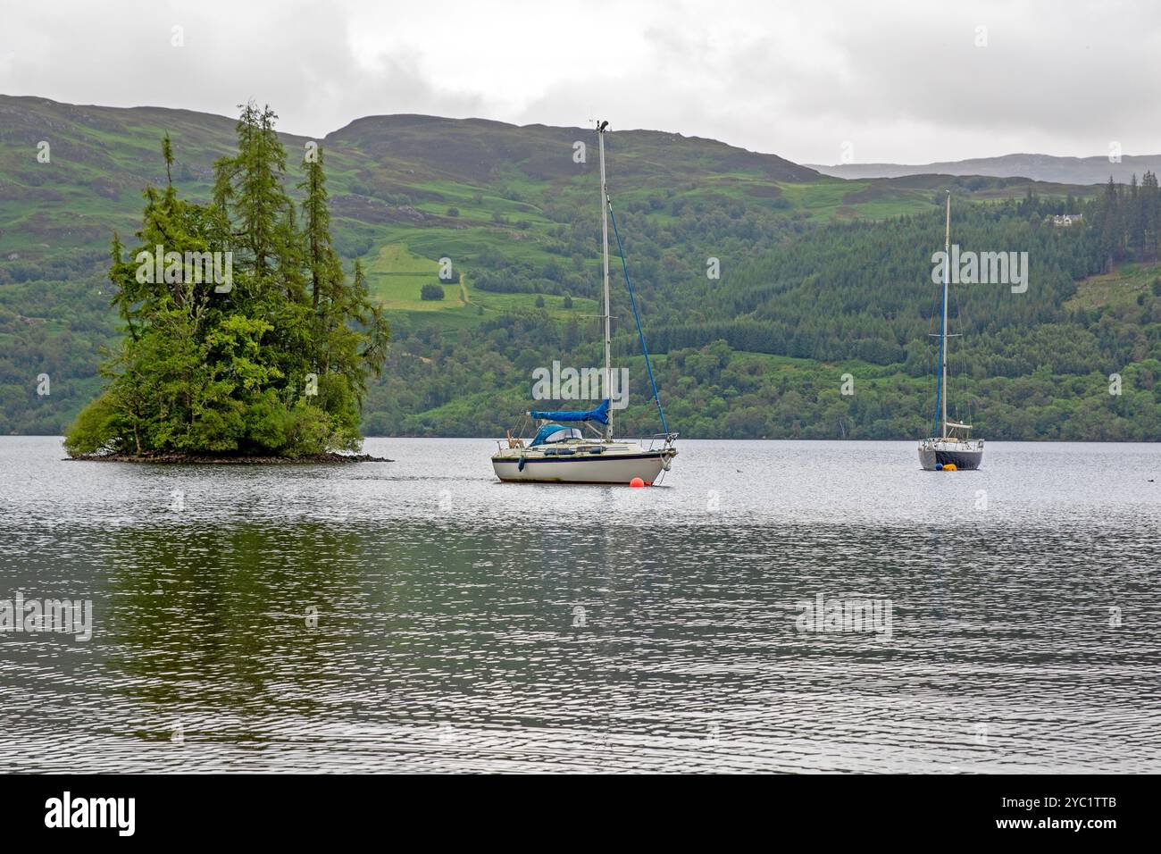 The crannog (human-made island) of Cherry Island in Loch Ness Stock ...