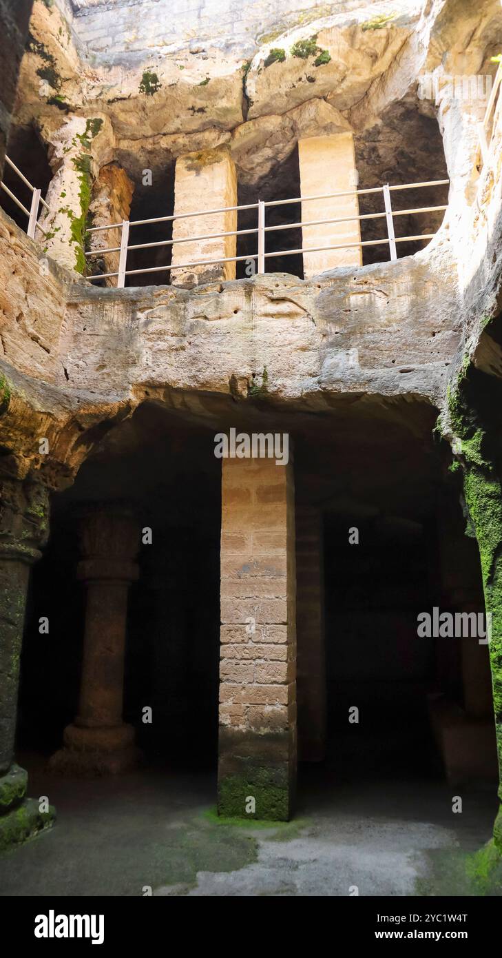 Ancient ruined view of a Buddhist cave inside Uparkot Fort, Junagadh ...