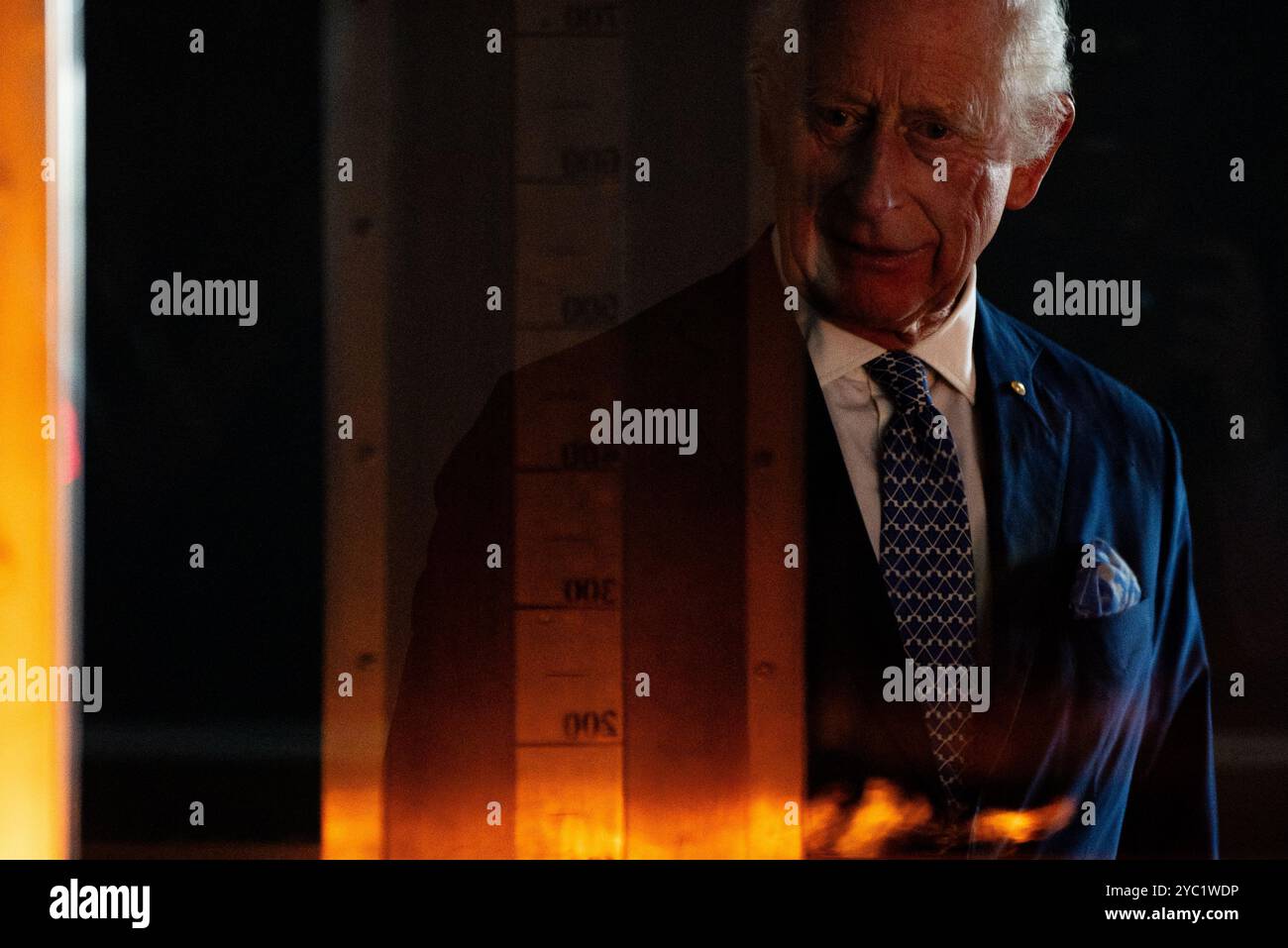 King Charles III views the Pyroton fire demonstration during a visit to ...