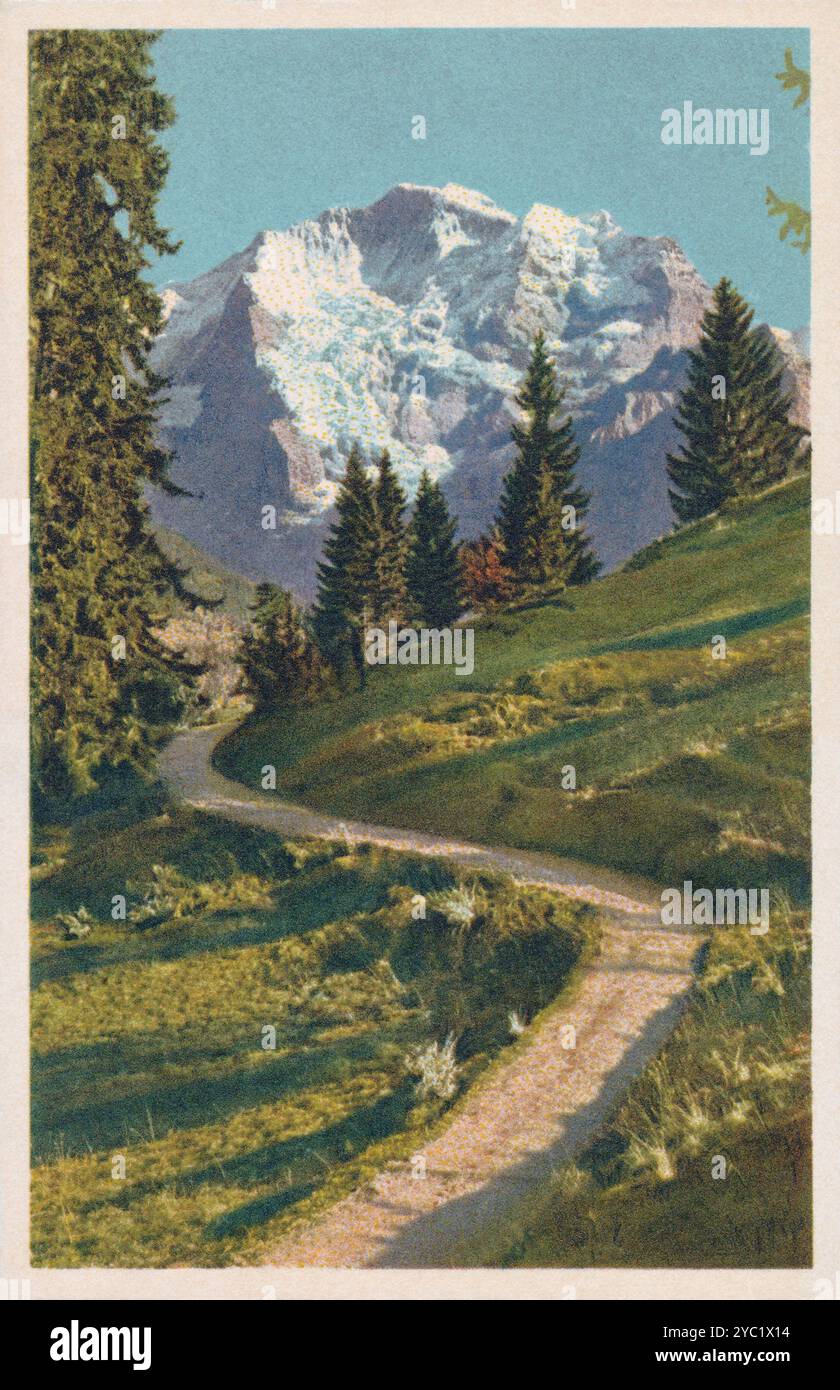 Vintage postcard of the path to Grütschalp and the Jungfrau mountain in ...
