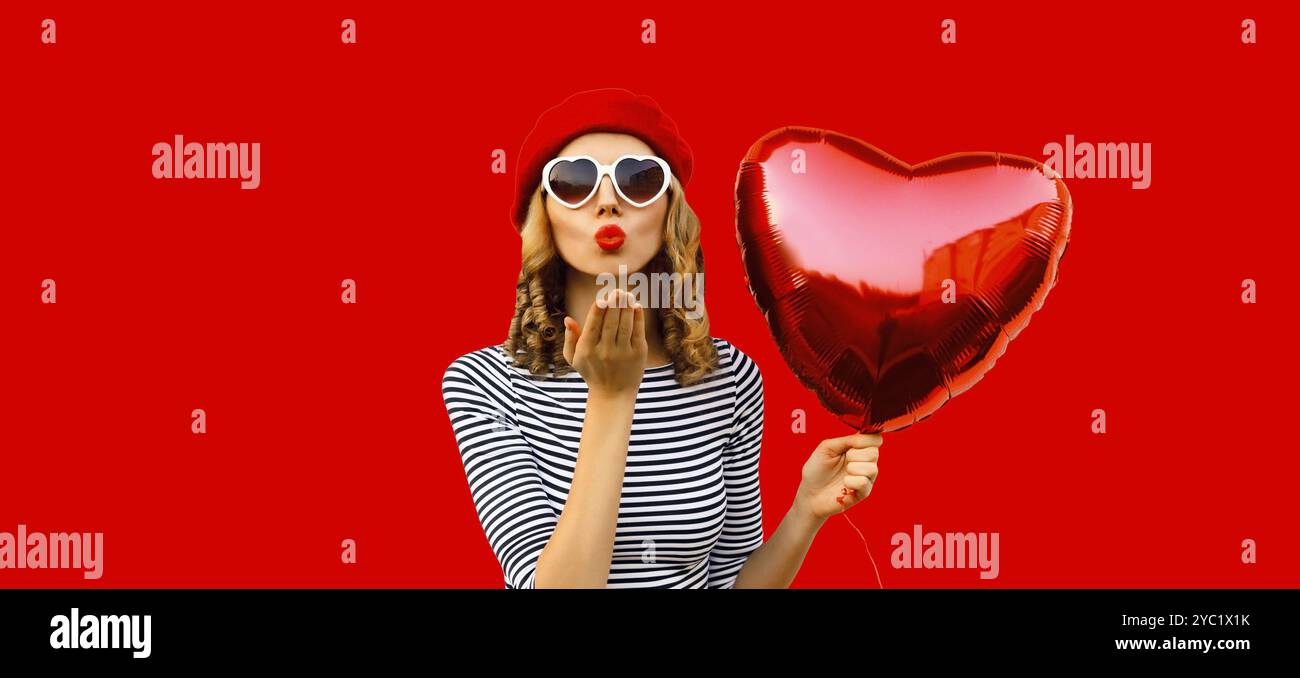 Sweet portrait of beautiful happy young woman with red heart shaped ...
