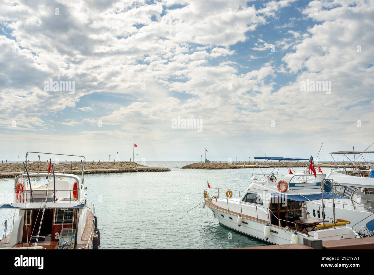 Tourist boats and jetty in Side, one of Turkey's unique and historical ...