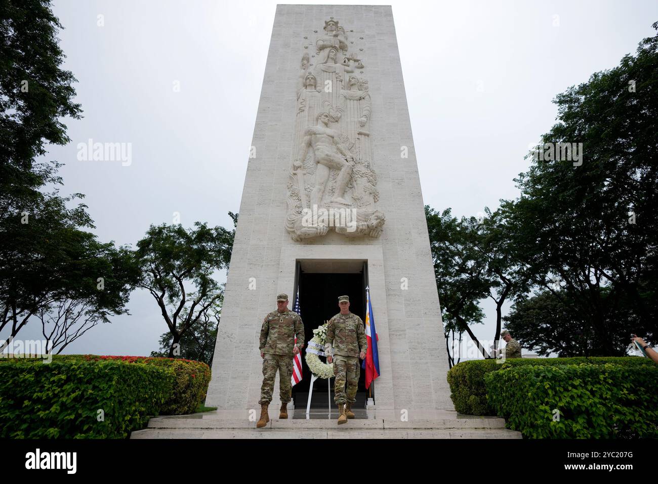 U.S. Maj. Gen. Marcus Evans, right, commanding general of the U.S. Army ...