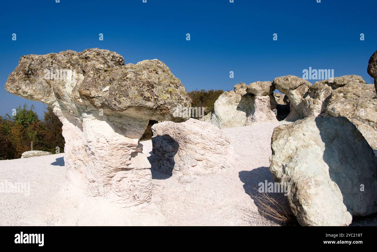 Group of wind eroded stone pillars hi-res stock photography and images ...