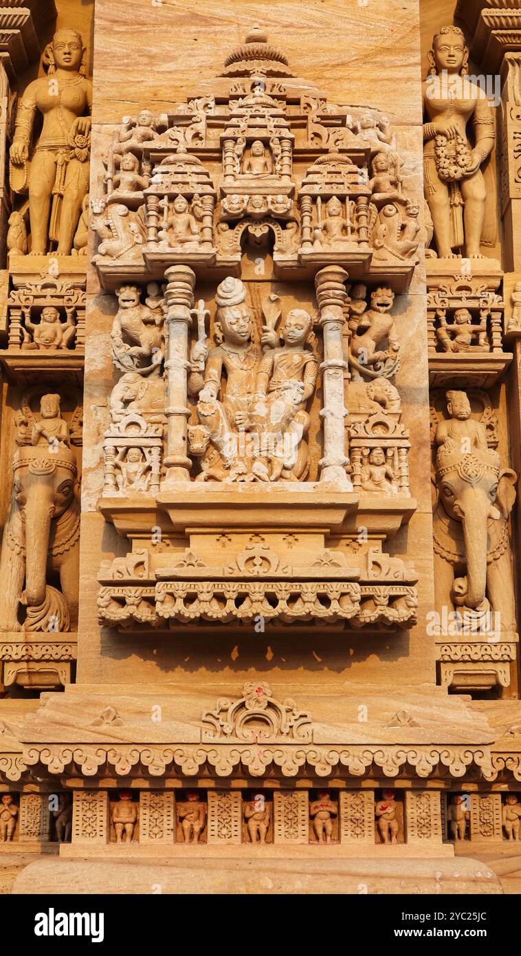 Carved sculpture of Lord Shiva with Parvati on Shri Trinetreshwar ...
