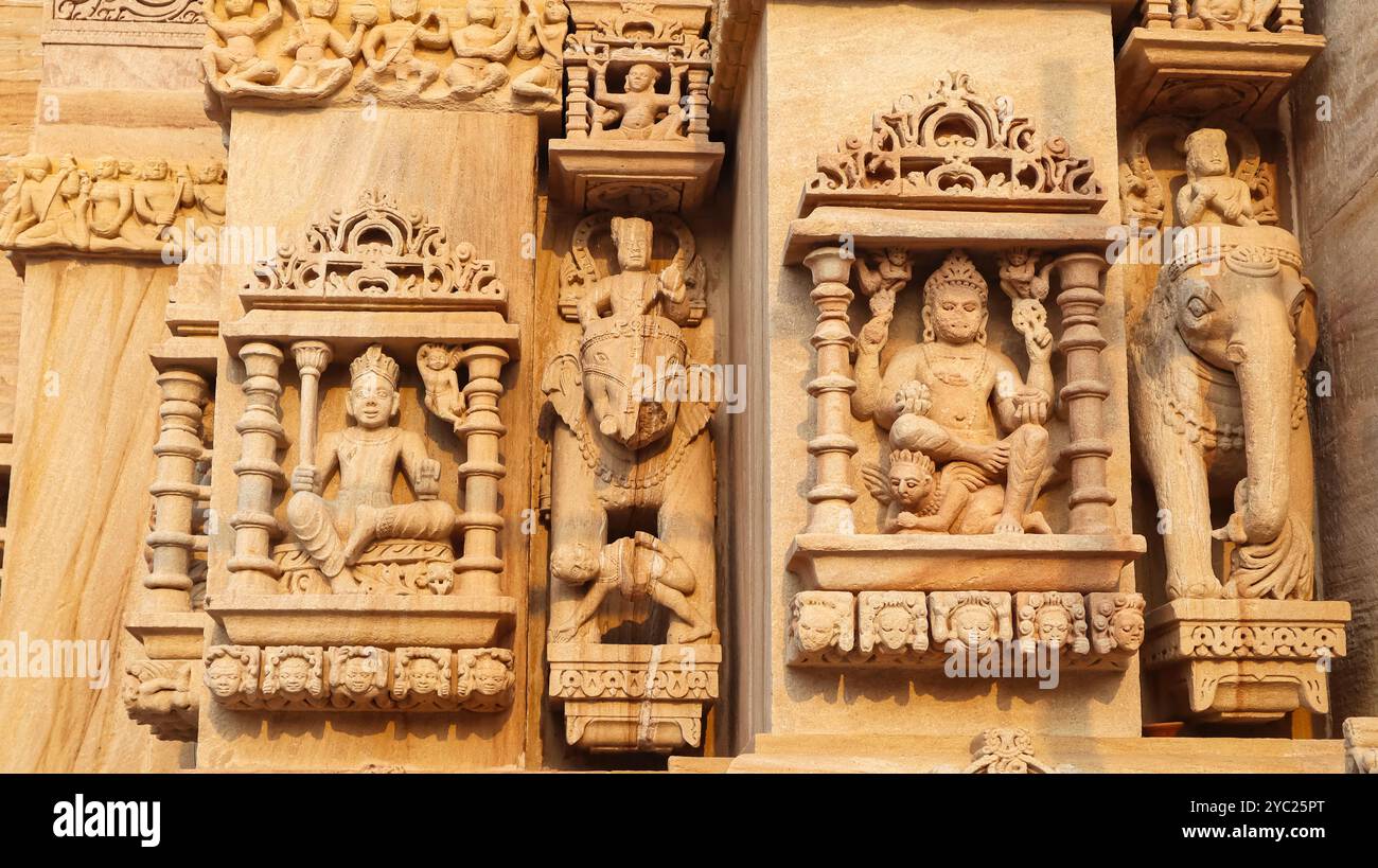 Carved sculpture of Hindu deities on Shri Trinetreshwar Mahadev Temple ...