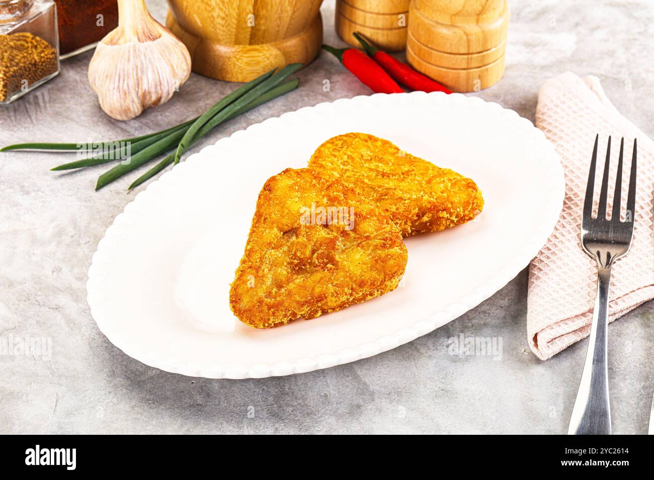 Fried potato hash brown snack for breakfast Stock Photo - Alamy