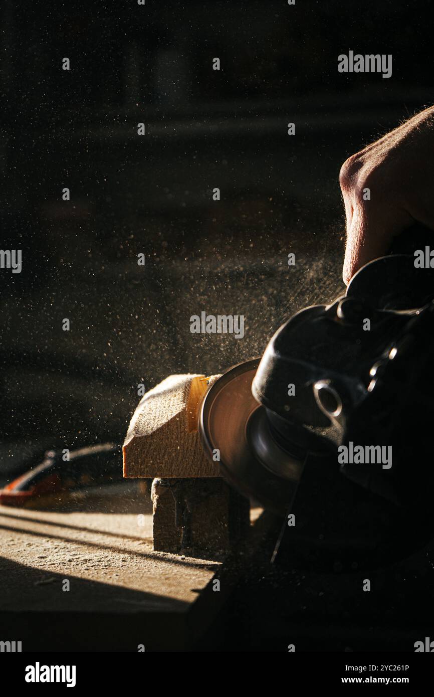 Woodworking process with sawdust flying Stock Photo - Alamy
