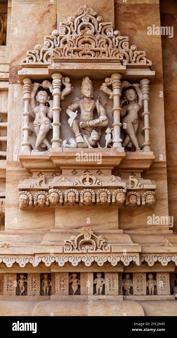 Carved sculpture of Lord Vishnu sitting on Garuda, his vahana, at Shri ...