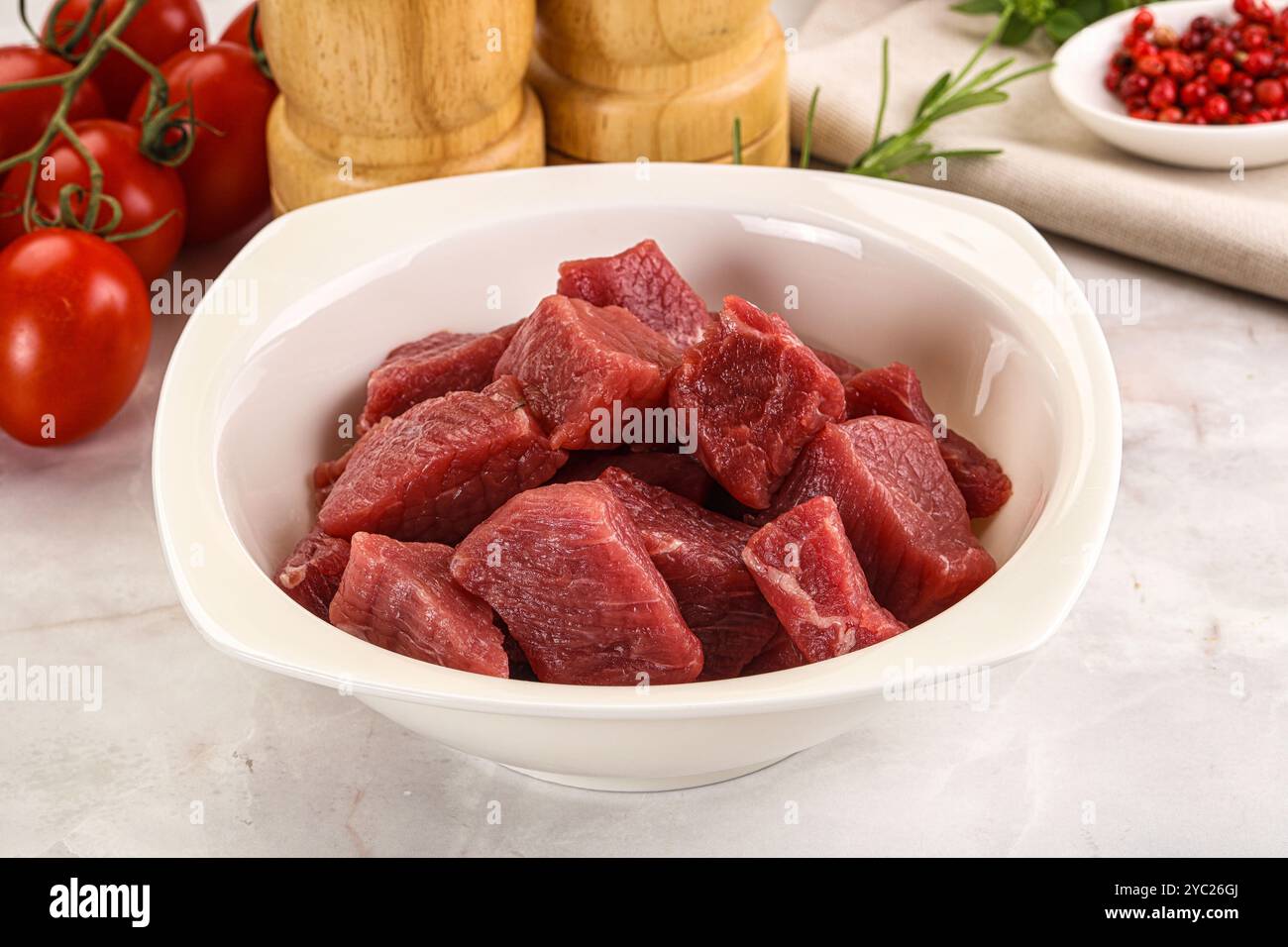 Raw beef diced cubes for cooking Stock Photo - Alamy