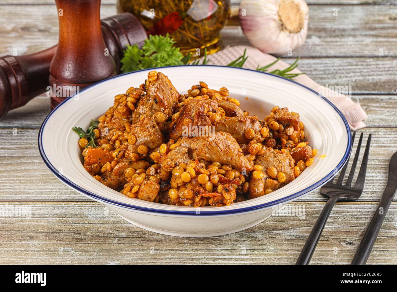 Rasted chicken meat with ptitim and vegetables Stock Photo - Alamy