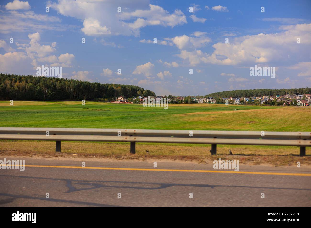 Road shoulder on a sunny autumn day. Views of the landscape from the ...