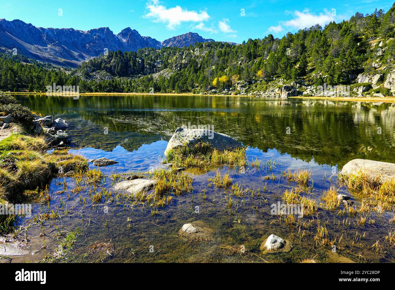 The small mountain lake of Estany Primer de Pessons., Autumn in Andorra ...