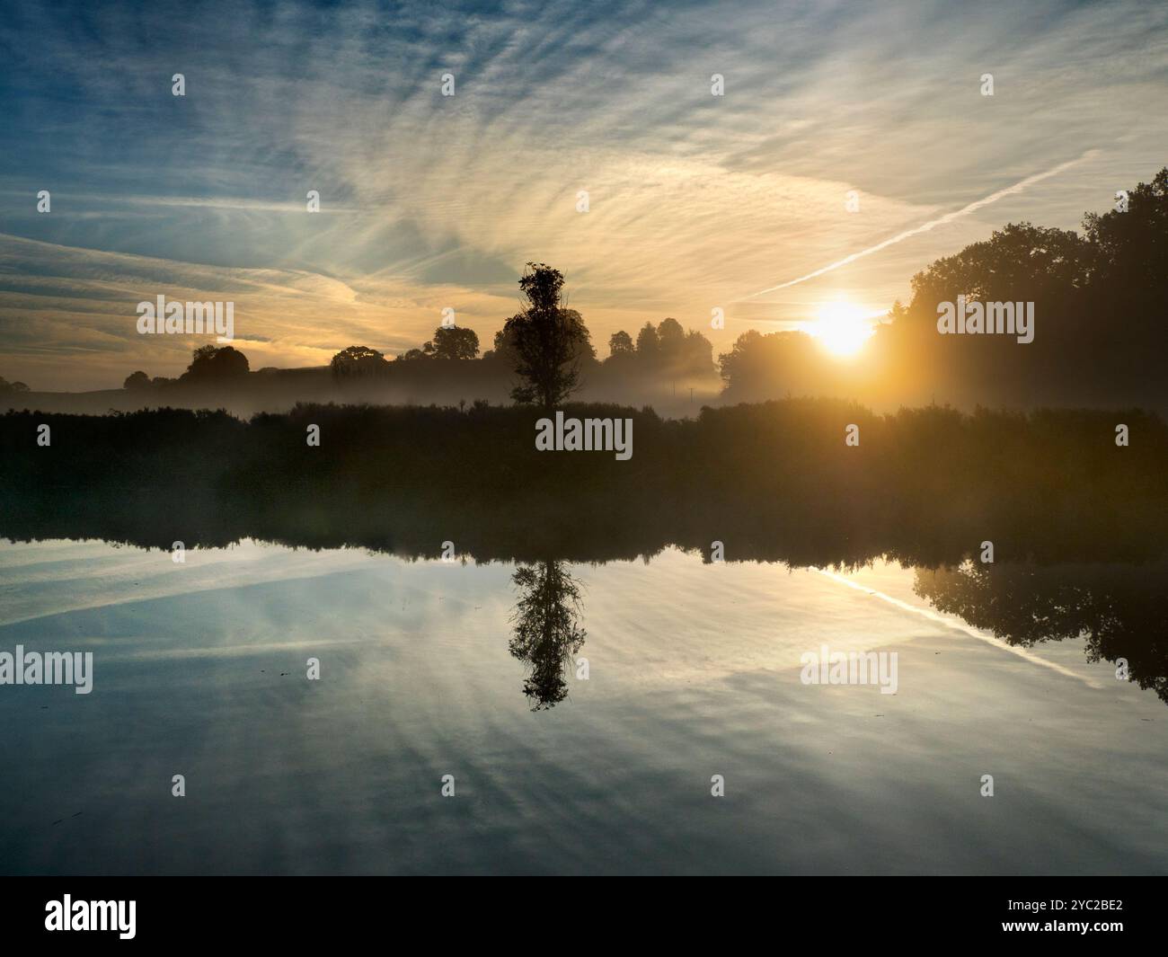 Flying down over sunrise cloudscape hi-res stock photography and images ...
