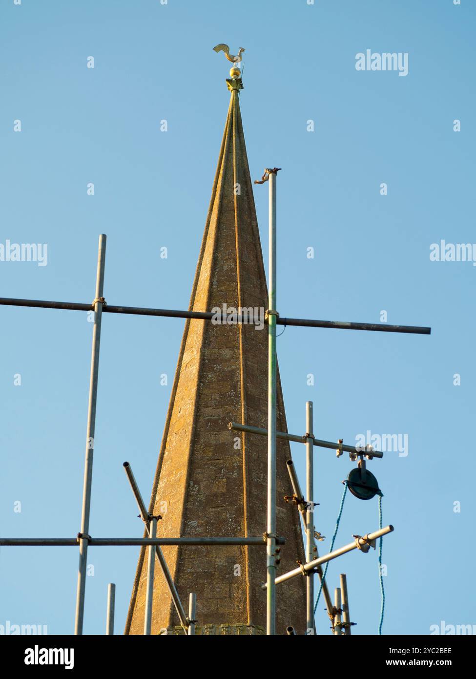 A view of the spire of St Helens Church, Abingdon, partially obscured ...