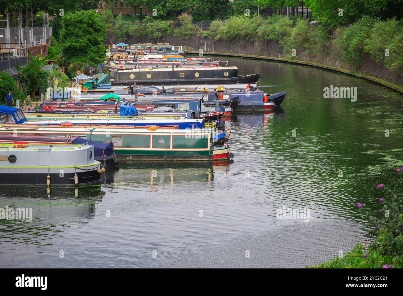 Row of narrow boats at Lisson Grove mooring site, part of Regent's ...