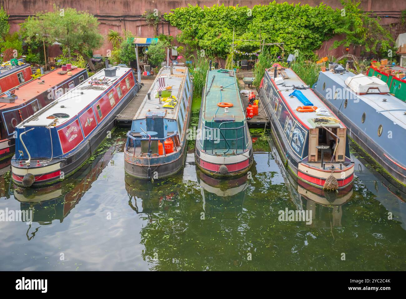 Row of narrow boats at Lisson Grove mooring site, part of Regent's ...