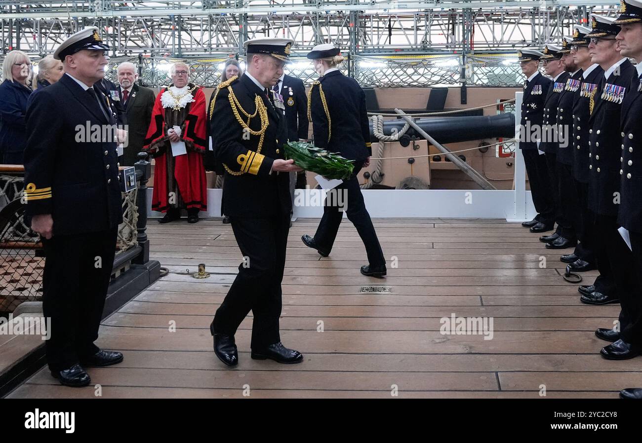 Vice Admiral Martin Connell lays a wreath on the spot where Vice ...