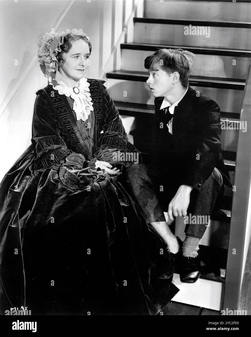 ELIZABETH RISDON as Widow Douglass and MICKEY ROONEY as Huck Finn n THE ...