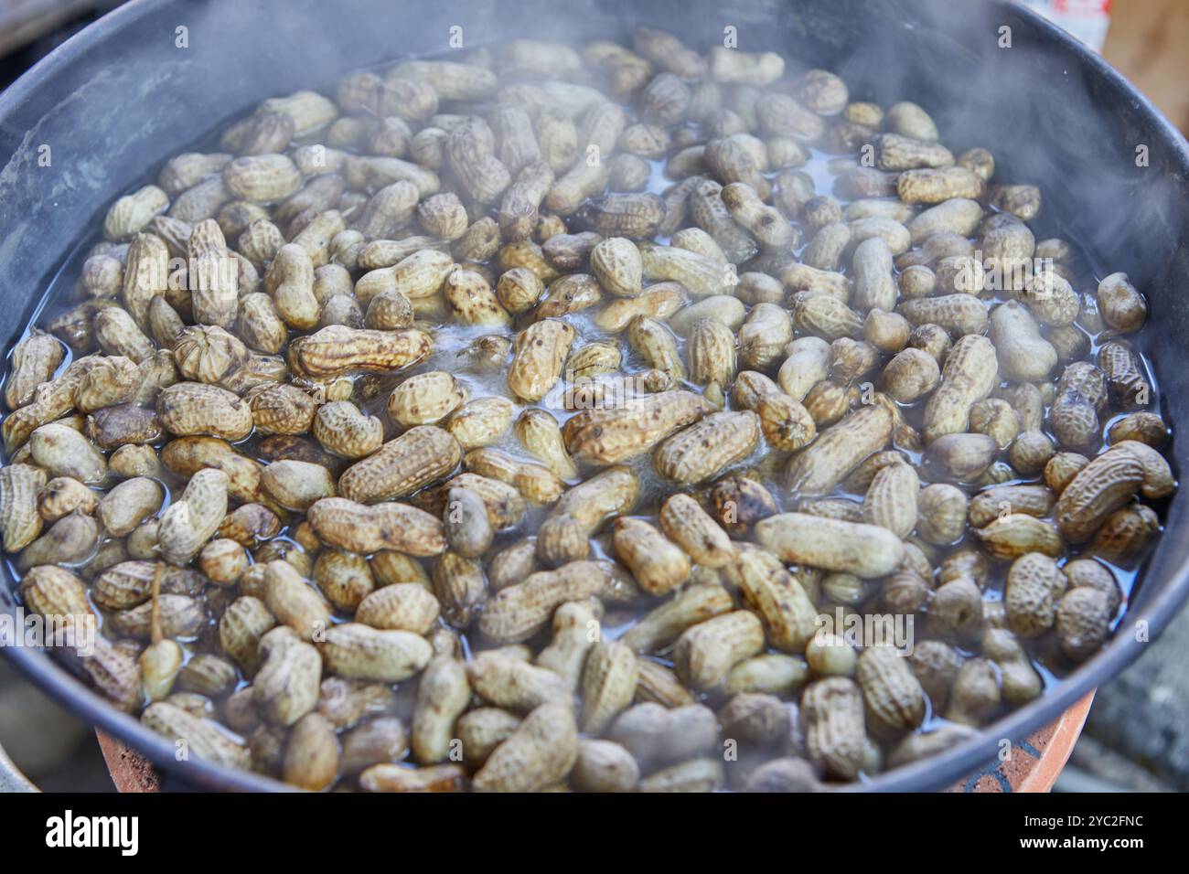 Close-up of boiled peanuts in hot pot Stock Photo - Alamy