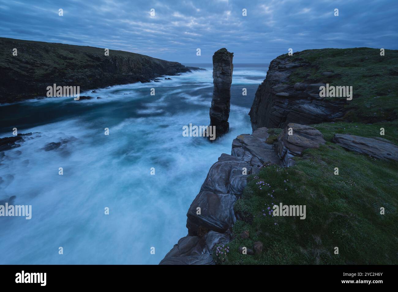 Waves flow around Yesnaby Castle sea stack, Orkney, Scotland Stock ...