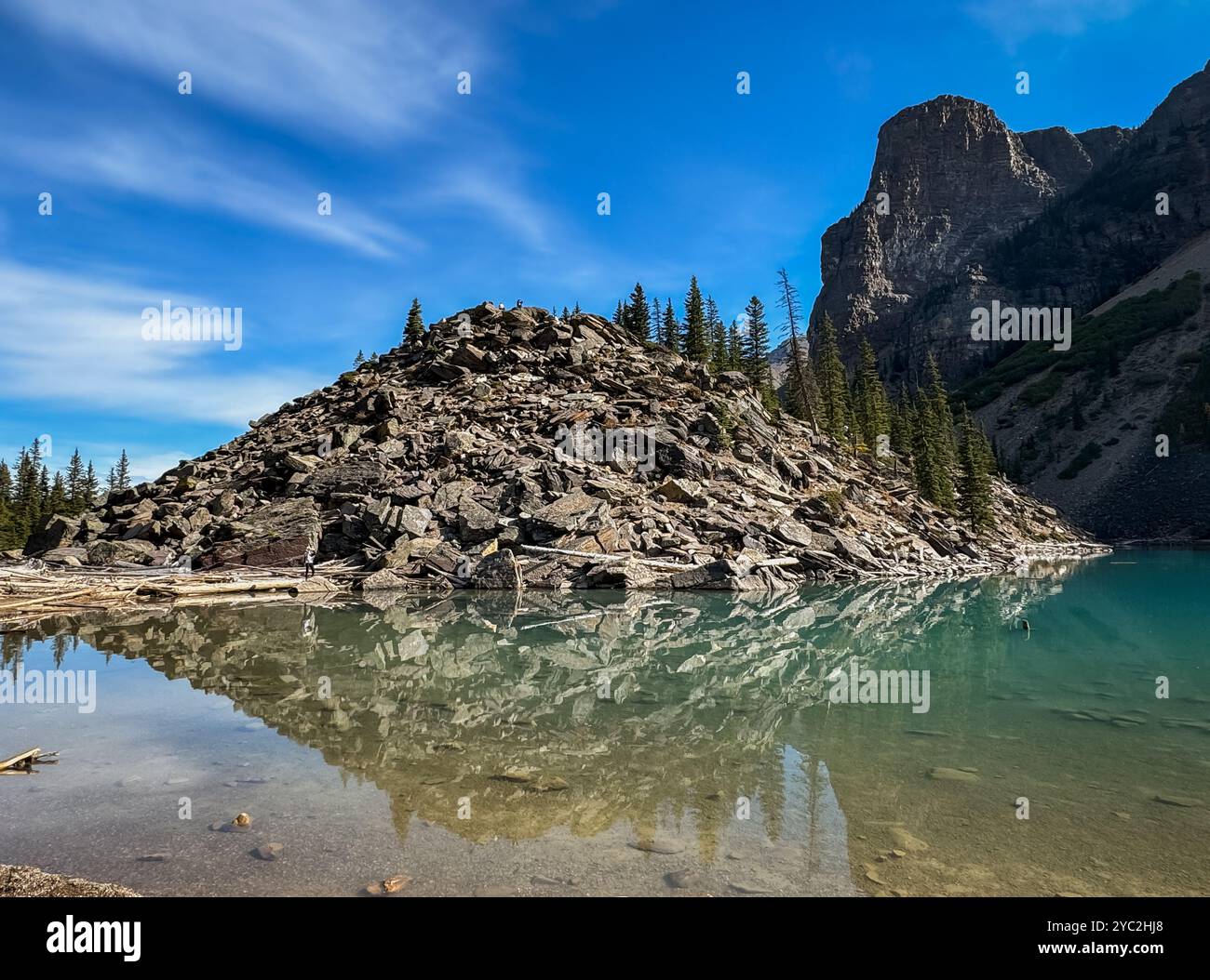 Rock Pile on end of Moraine Lake in Banff, Alberta, Canada Stock Photo ...