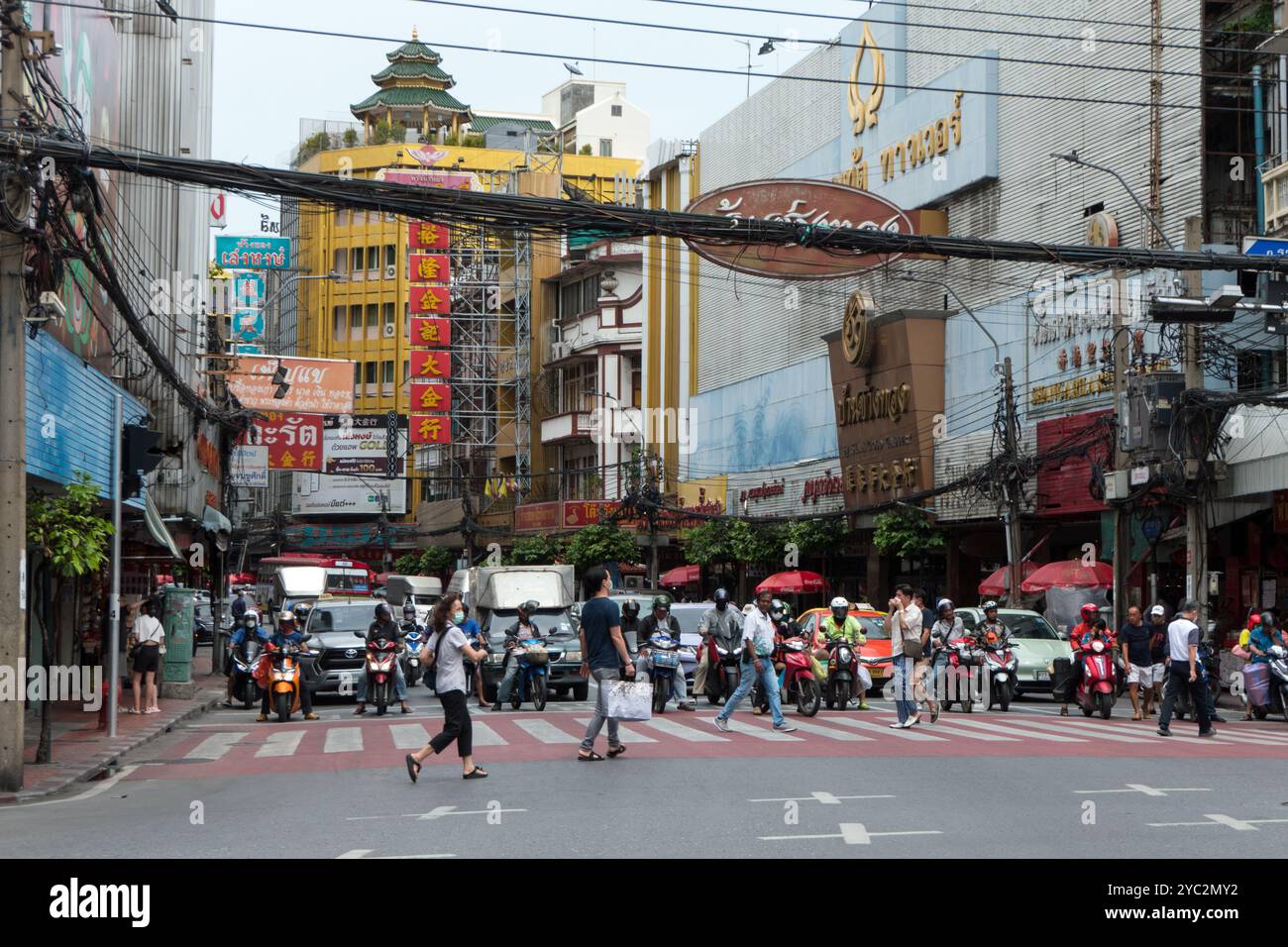 Street traffic in the Eachit area of Bangkok, Thailand, Asia. Cars and ...