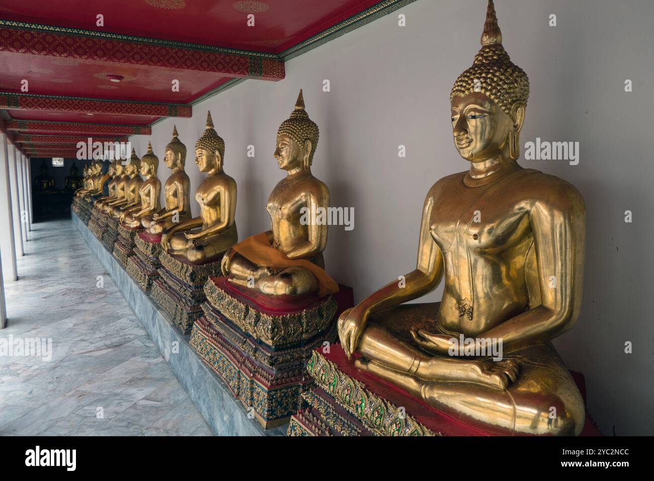 Golden Buddha statues at Wat Pho, Buddhist temple complex and tourist attraction in Bangkok ...