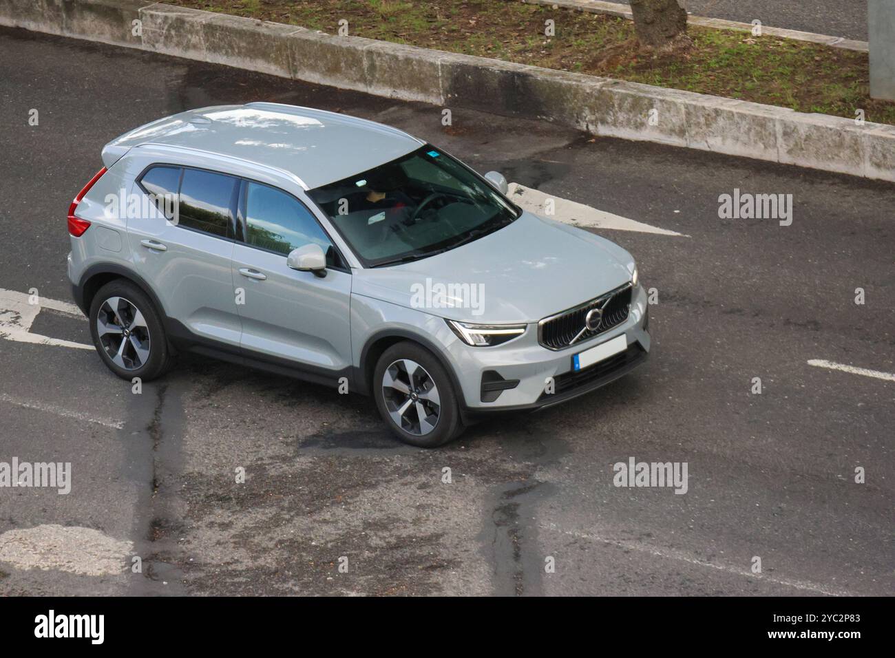 Modern grey volvo xc40 suv is driving on the road Stock Photo - Alamy