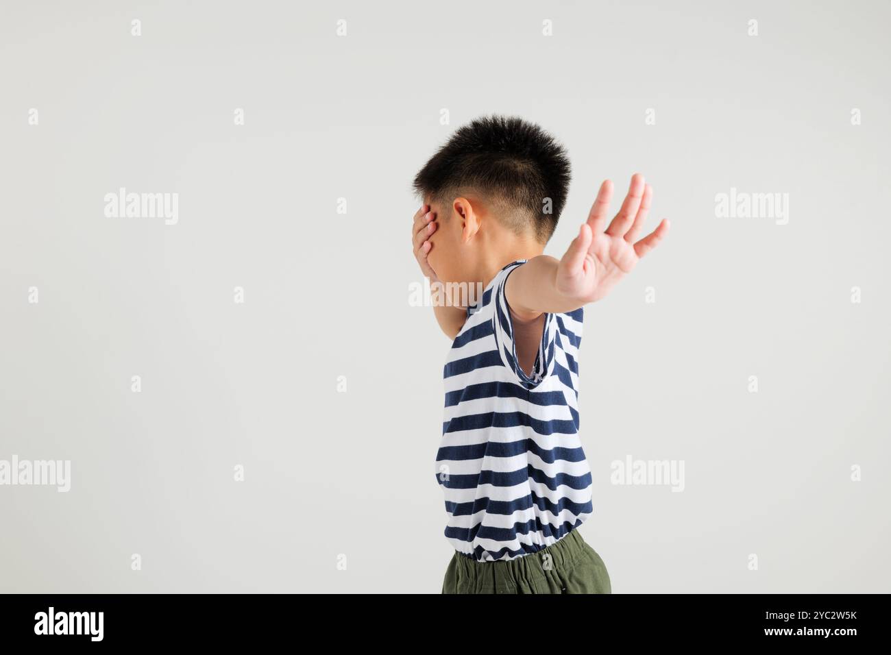 Stop hand of primary child. Asian little kid boy doing stop sing ...