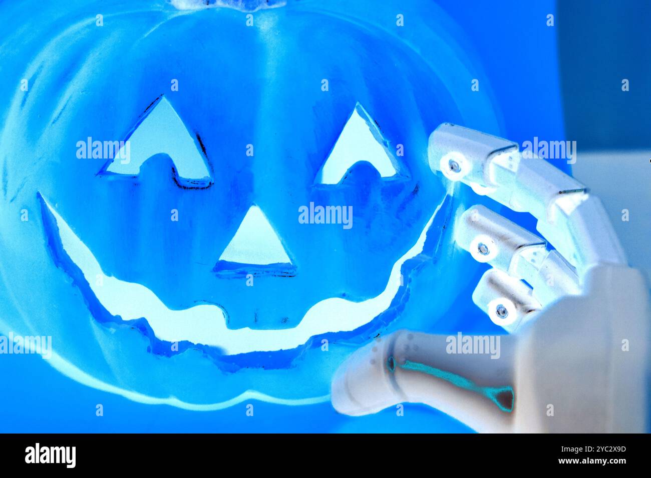 Robot Arm Holds Halloween Jack-o-Lantern, Modern Tech Meets Fall ...