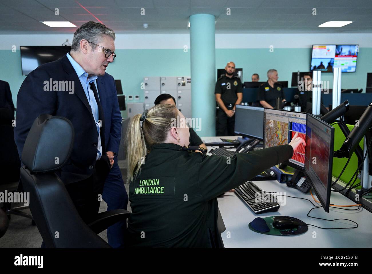 Prime Minister Sir Keir Starmer listens to a demonstration by Siobhan ...