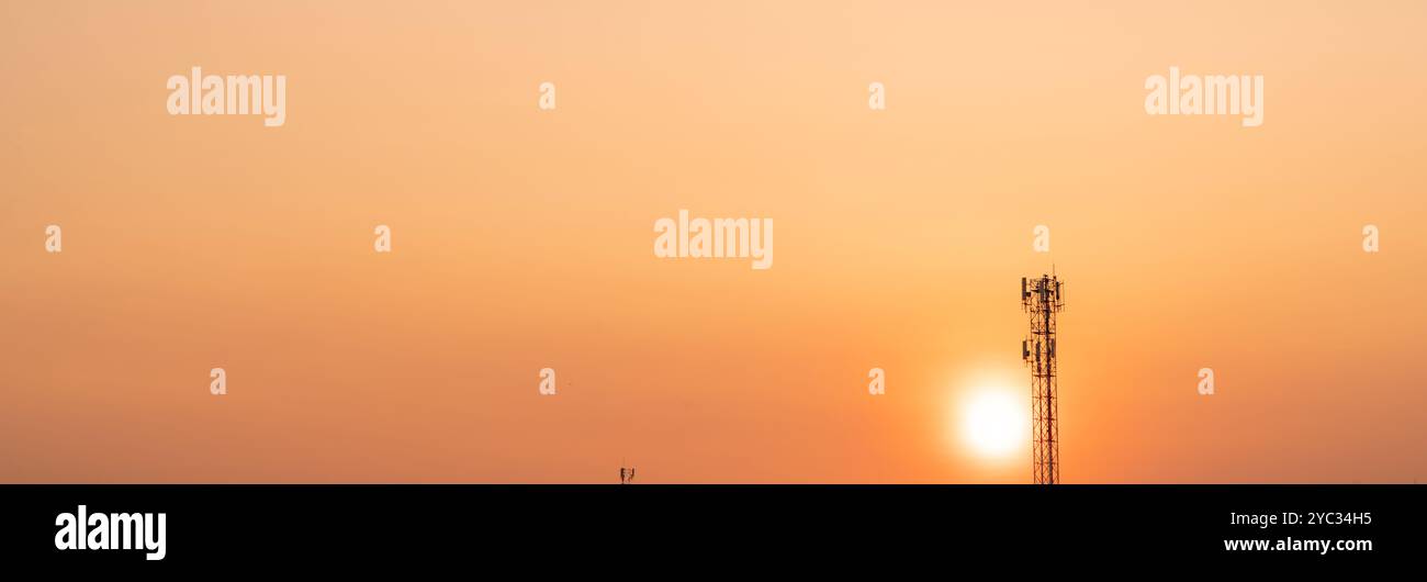 Telecommunication tower with antenna at sunset. Infrastructure of ...