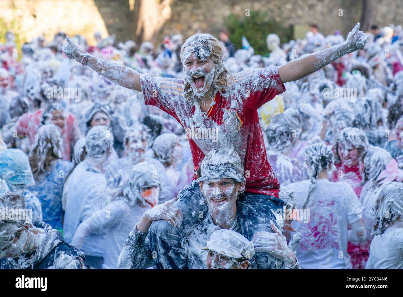 Students take part in the traditional Raisin Monday foam fight on St ...