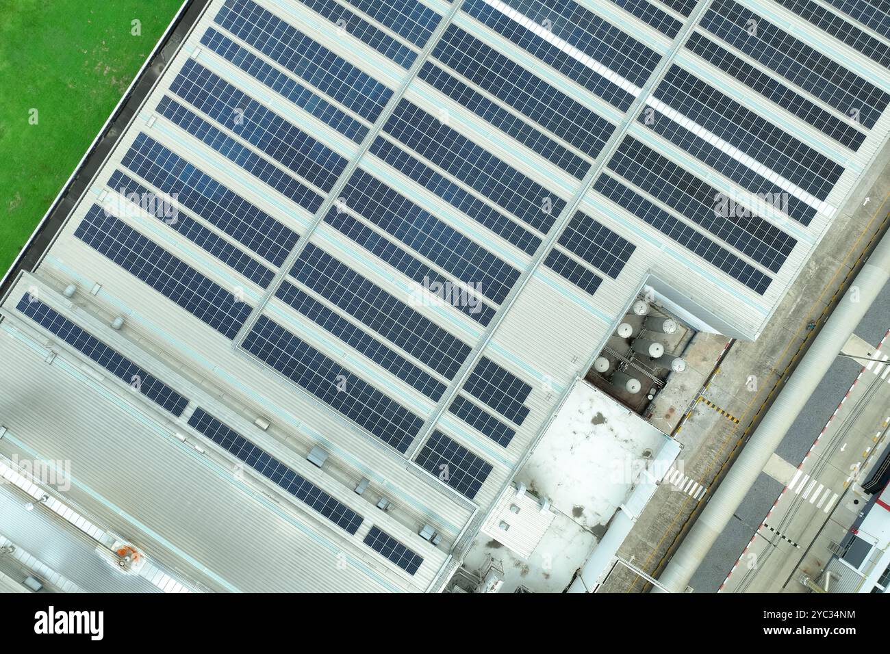 Solar energy for factory and warehouse building. Solar panels on roof ...