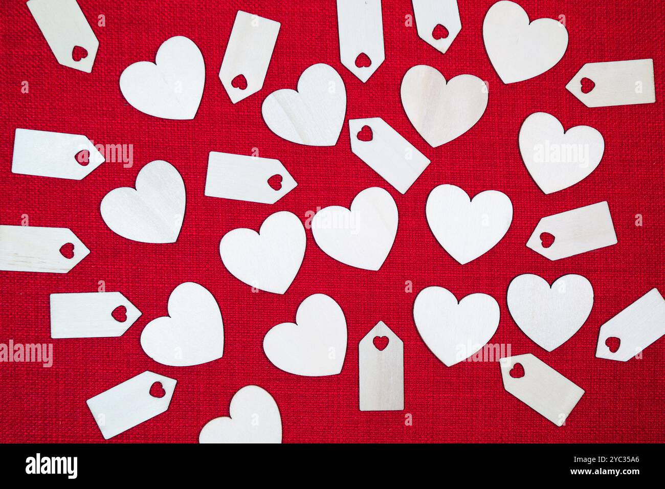 Wooden hearts and decorative heart label blank tags display against a ...