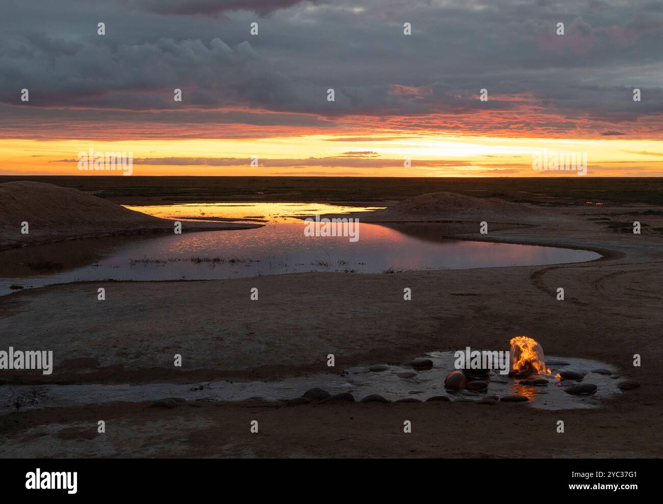 Burning methane gas at a source, Kalmykia Stock Photo - Alamy