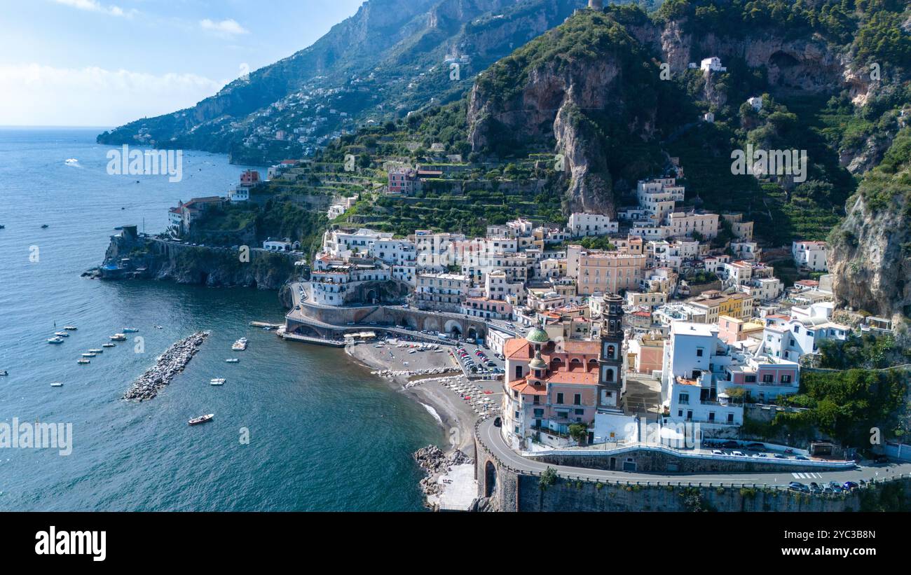 Nestled between magnificent cliffs, the charming village along the ...