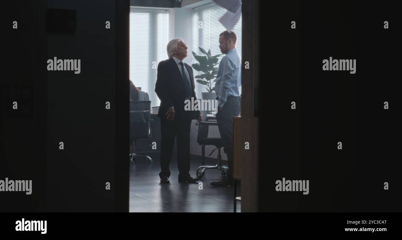 In modern office of bank: Irritated, angry boss having fight with male ...