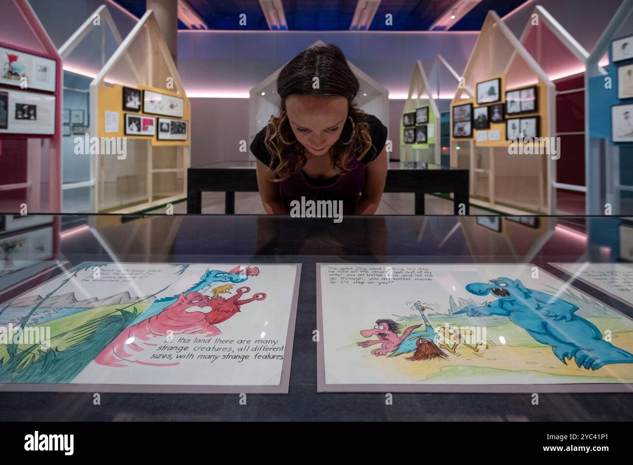 London, UK. 21 October 2024. A staff member views illustrations for ...