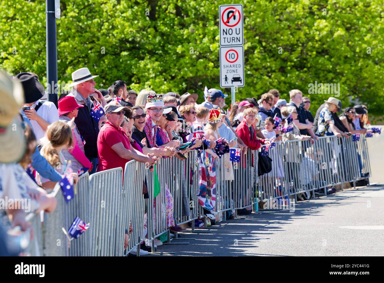 Canberra, Australia. 21st Oct, 2024. The general public await the arrival of Queen Camilla and ...