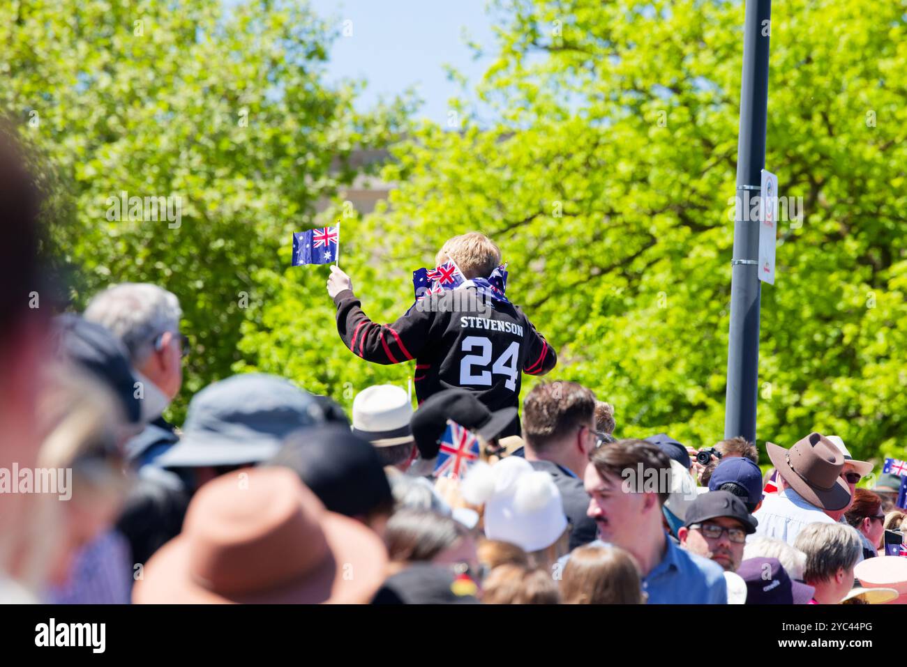 Canberra, Australia. 21st Oct, 2024. The general public await the arrival of Queen Camilla and ...