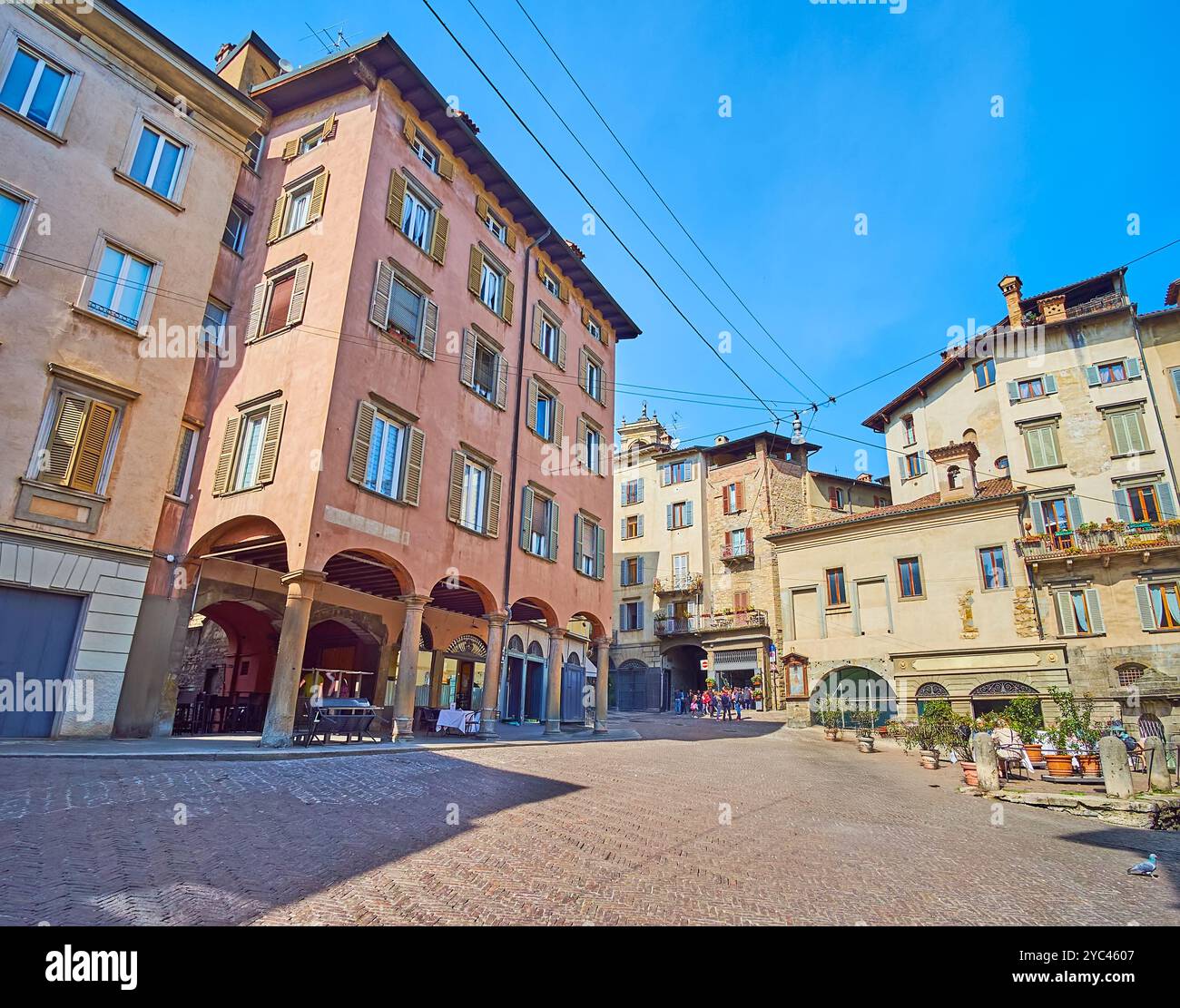 The dense vintage houses surround the medieval Piazza Mercato delle ...