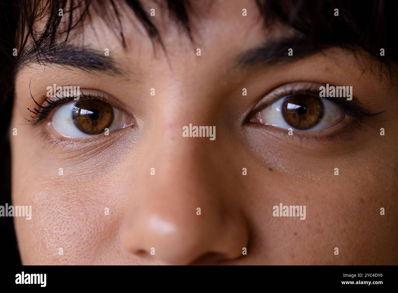 Close-up of woman's eyes, expressing curiosity and focus at home Stock ...