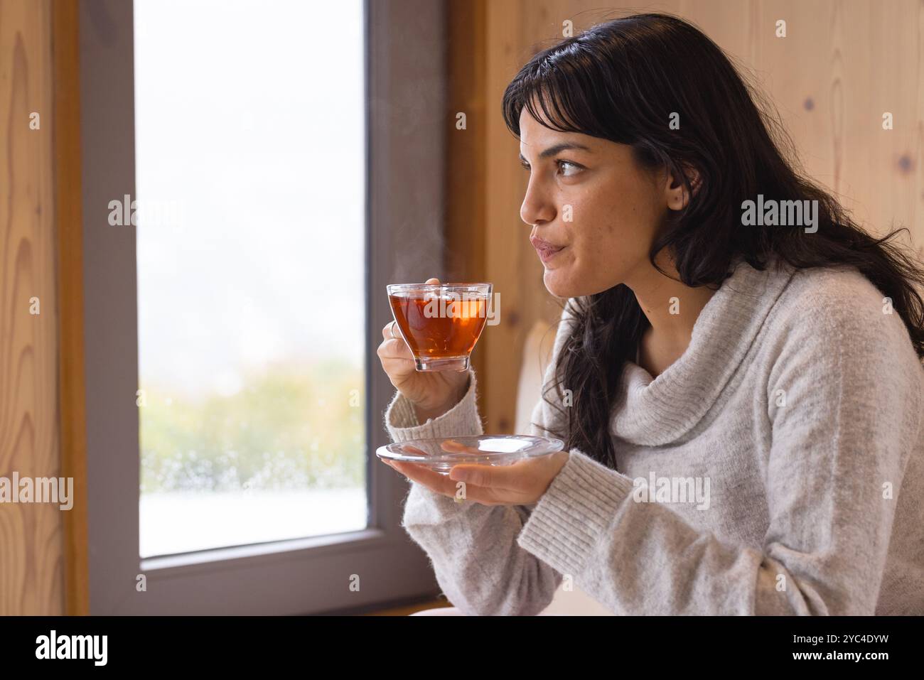 Woman drink chamomile tea hi-res stock photography and images - Alamy