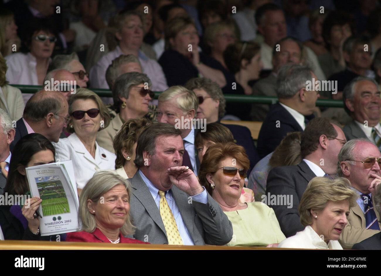 Television and radio presenter Terry Wogan and his wife Helen watching ...